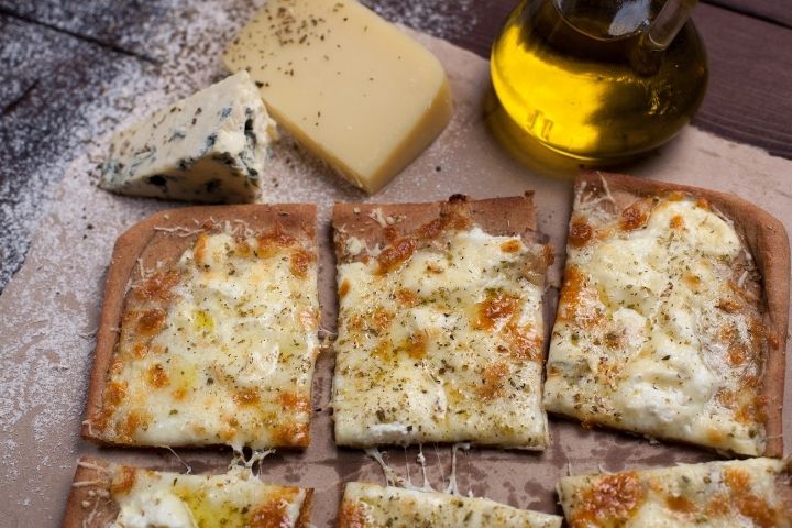 four-cheese pizza with balsamic caramelized onions– The Gracious Gourmet